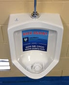 Urinal Ads and Logistics Marketing